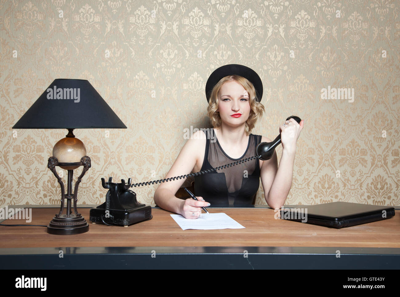 secretary takes notes during a call Stock Photo - Alamy