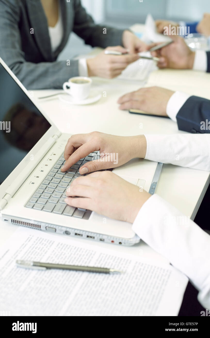 Working with laptop Stock Photo - Alamy