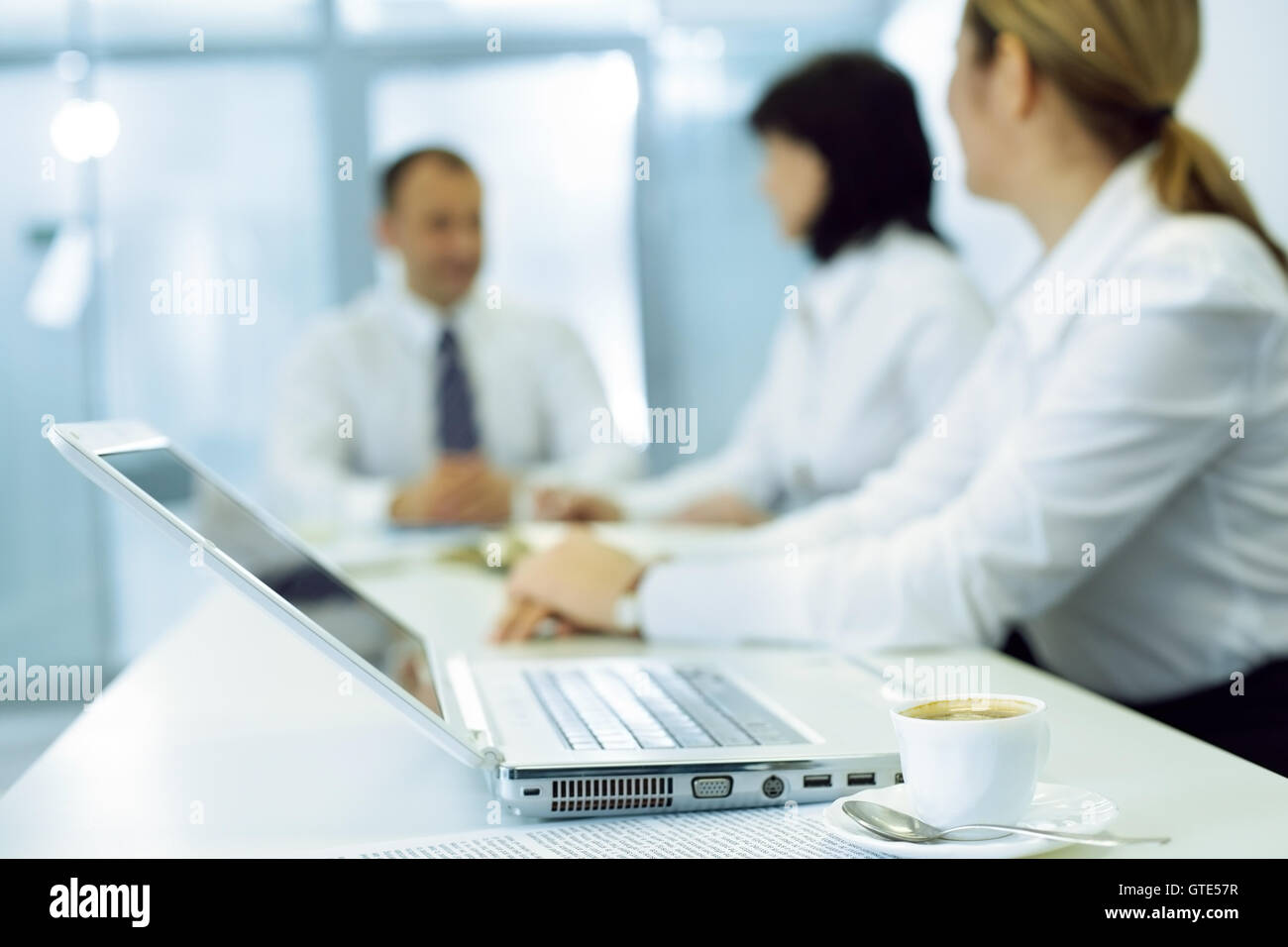 Laptop in business meeting Stock Photo - Alamy
