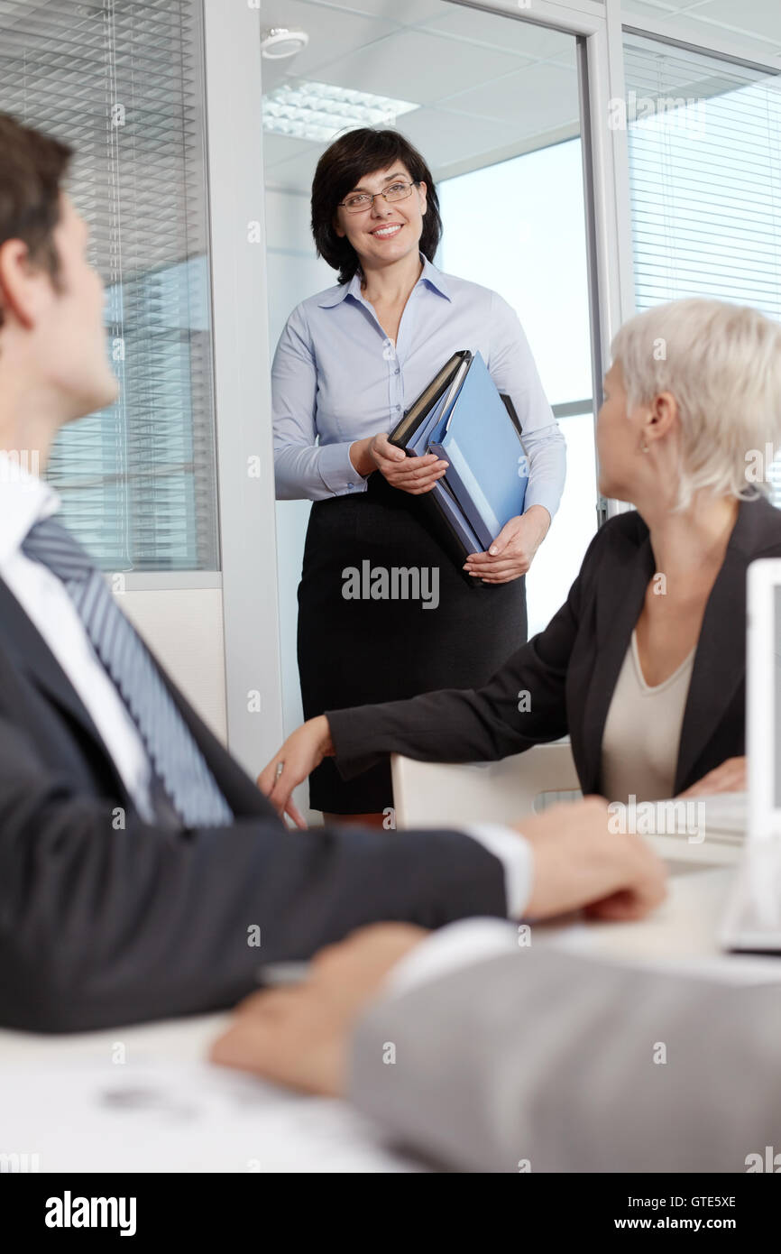 Female secretary entering office hi-res stock photography and images ...