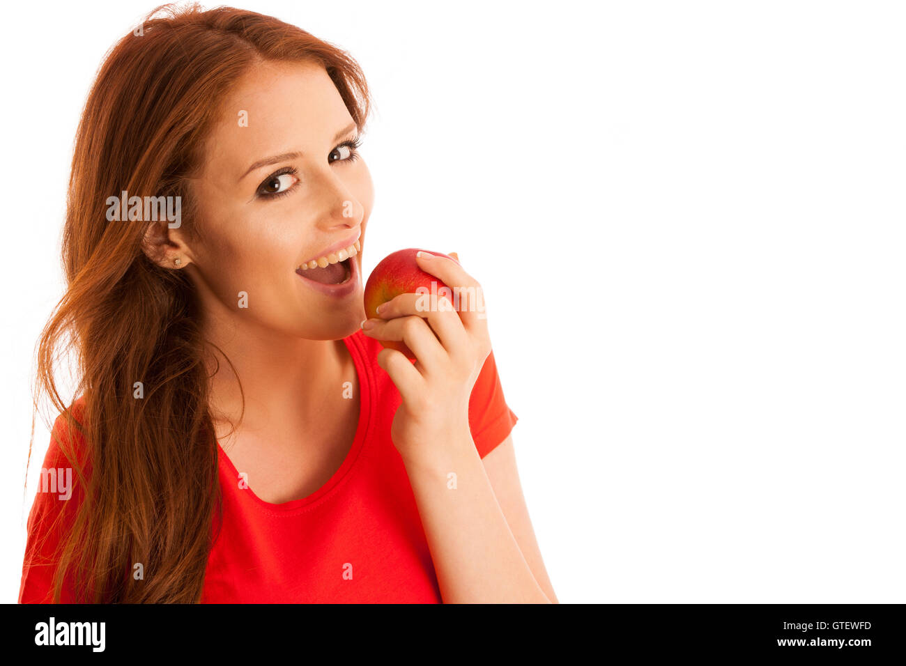 woman eating red apple isolated over white backgoround Stock Photo - Alamy