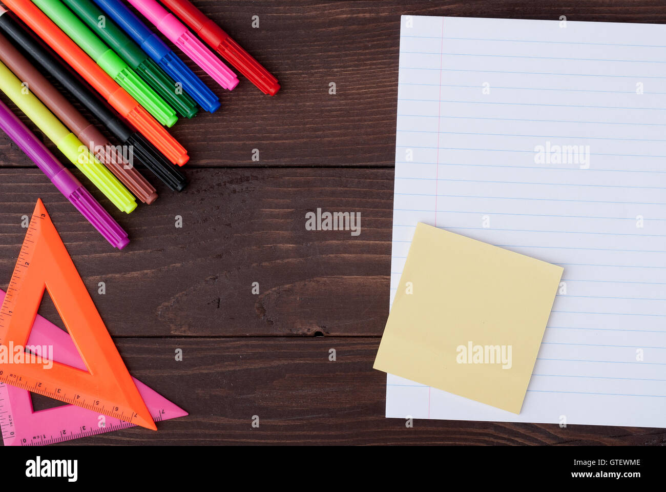 School stationery with copyspace on wooden board Stock Photo - Alamy