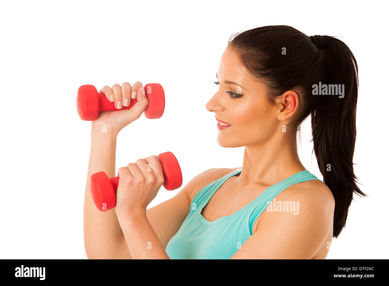 active woman with dumbbells workout in fitness gym isolated over white ...