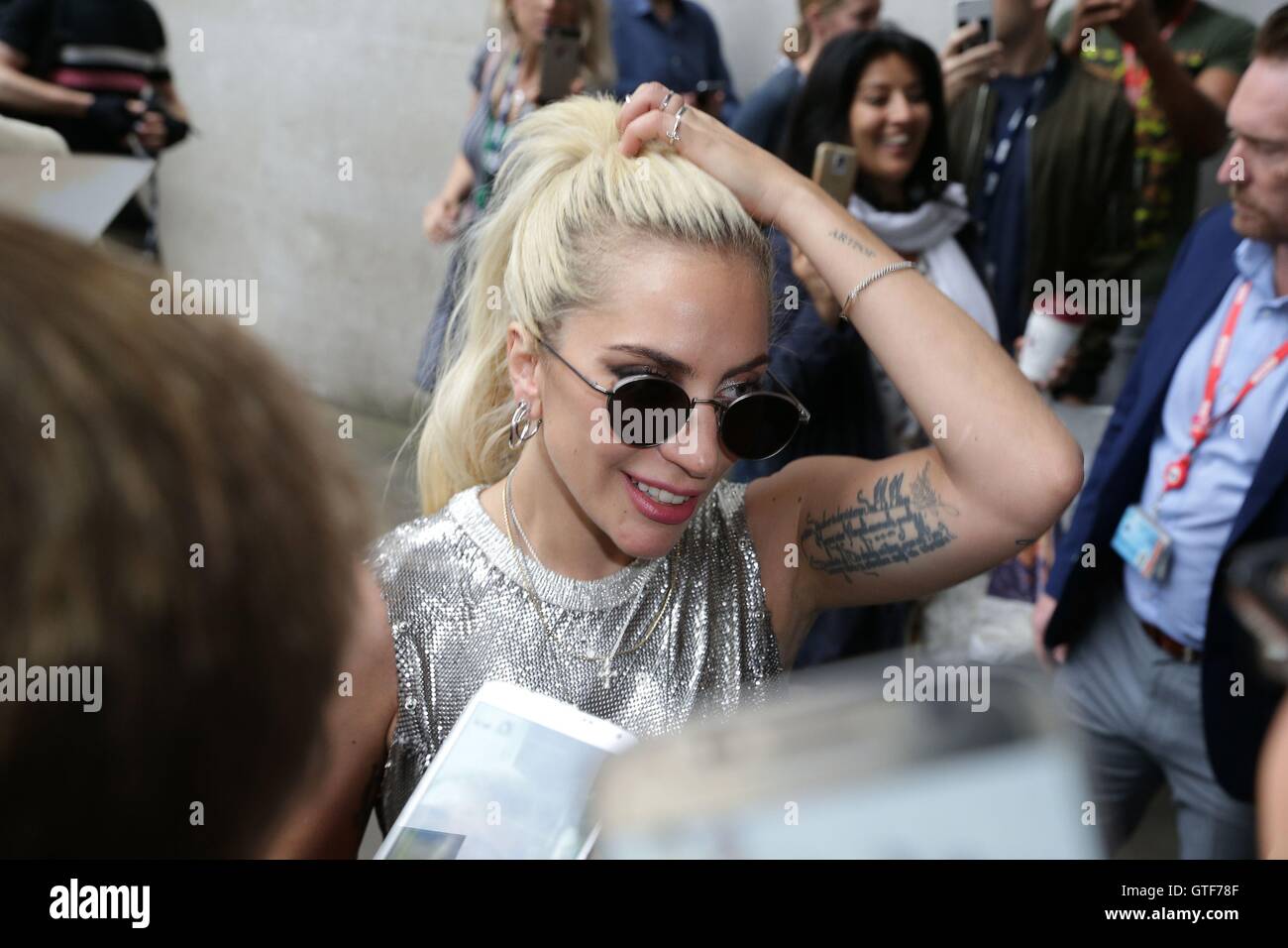 Lady Gaga signs autographs as she leaves BBC Broadcasting House in ...
