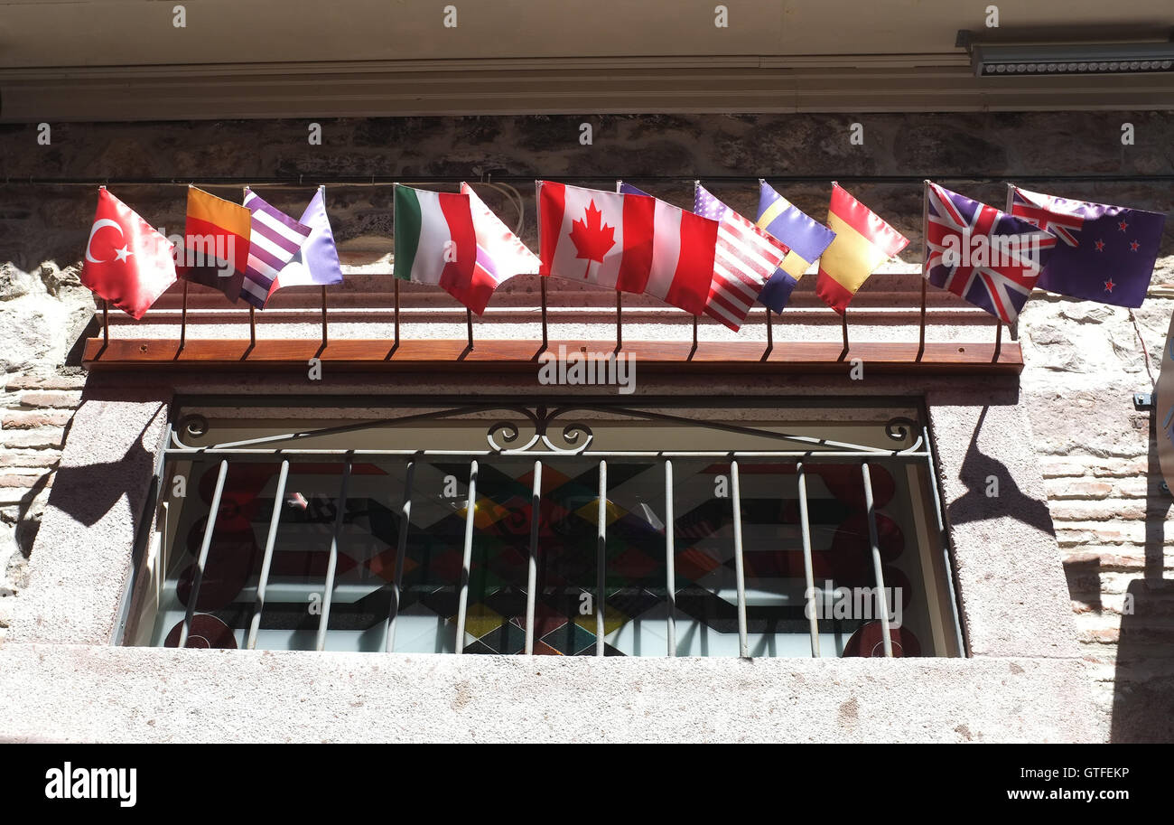Little country flags on a hotel window Stock Photo - Alamy