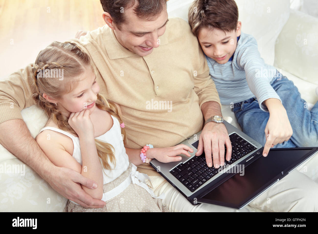 Father with children Stock Photo - Alamy