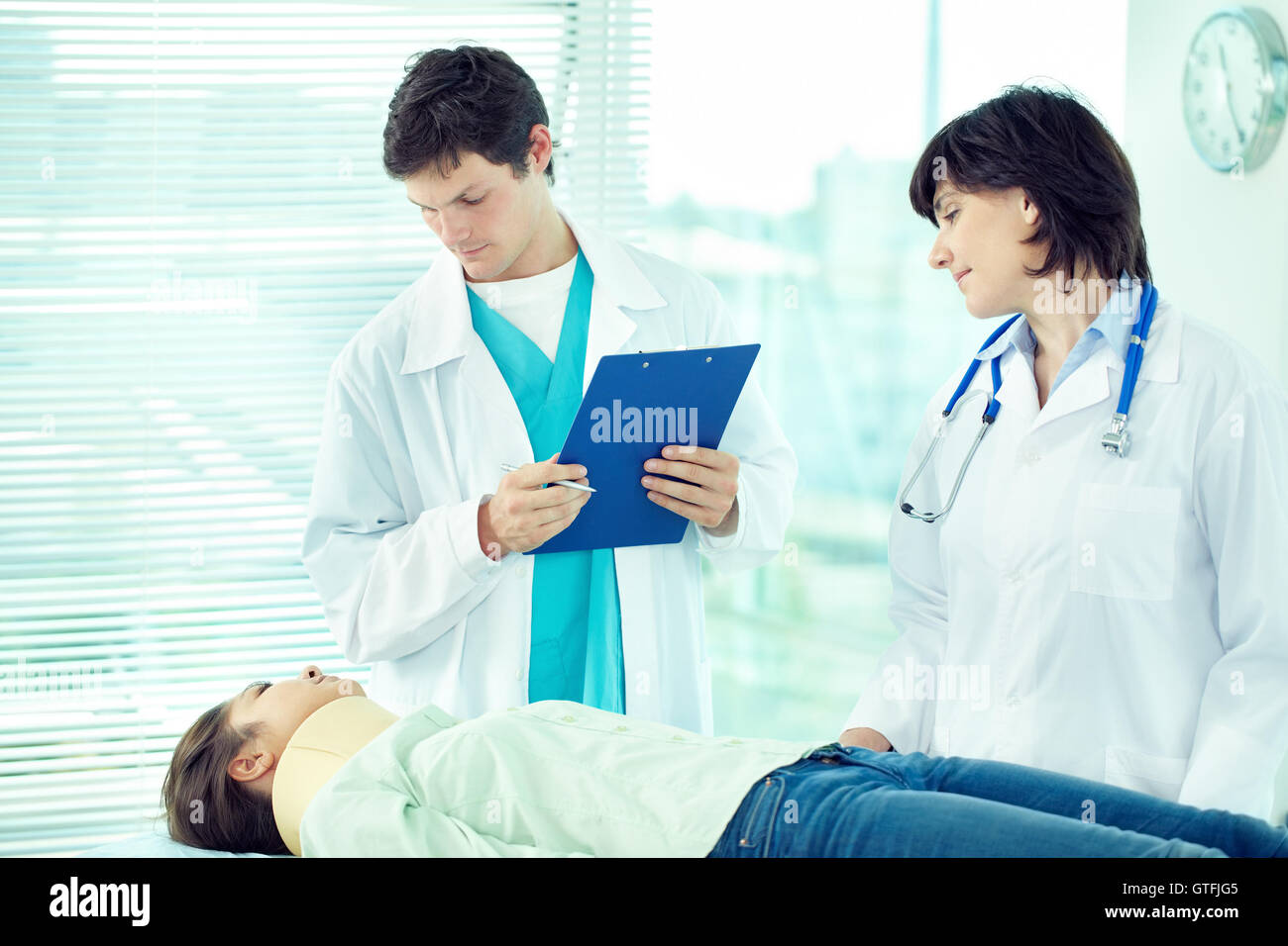 Doctors at work Stock Photo - Alamy