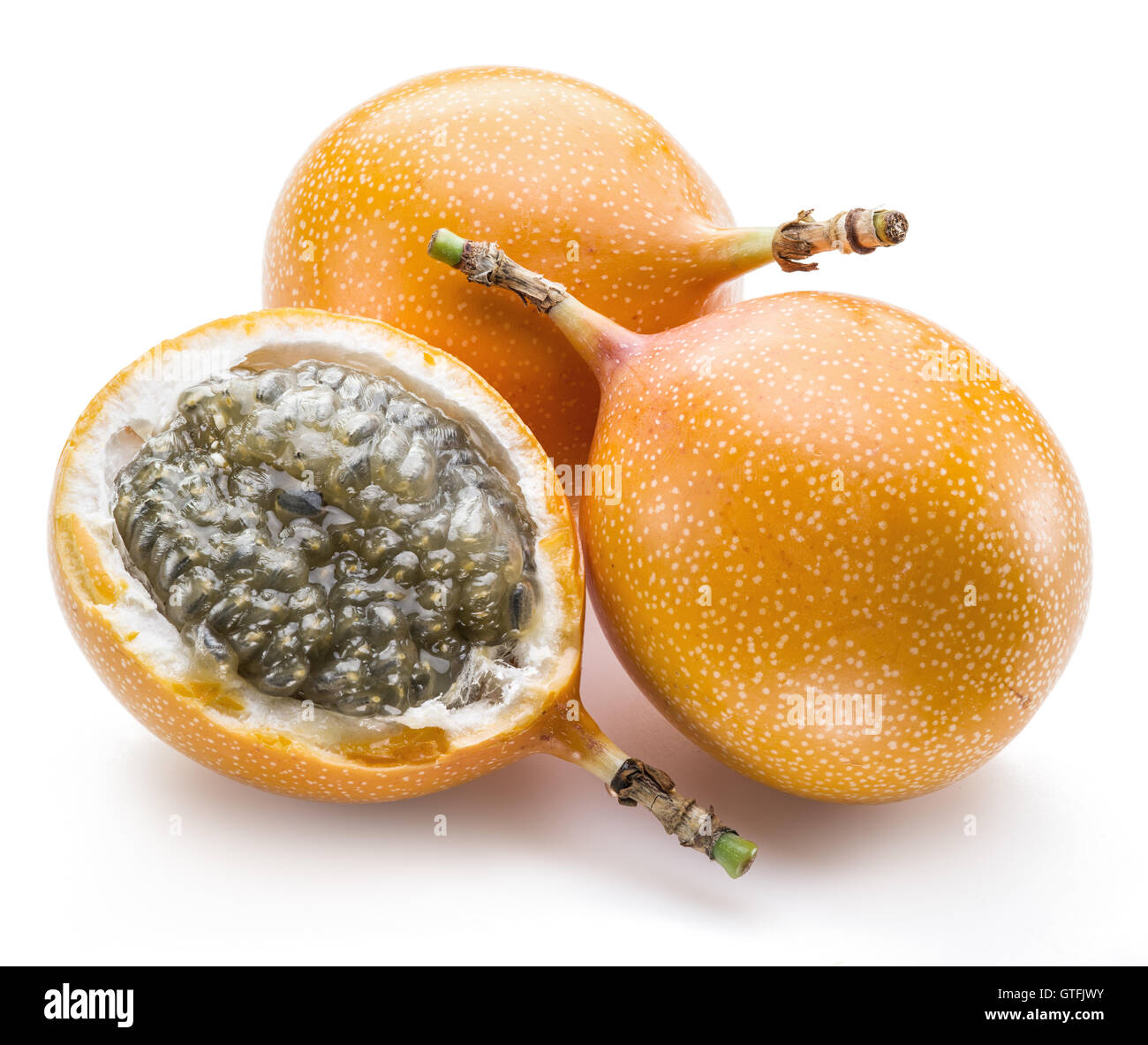 Granadilla fruits on the white background Stock Photo - Alamy