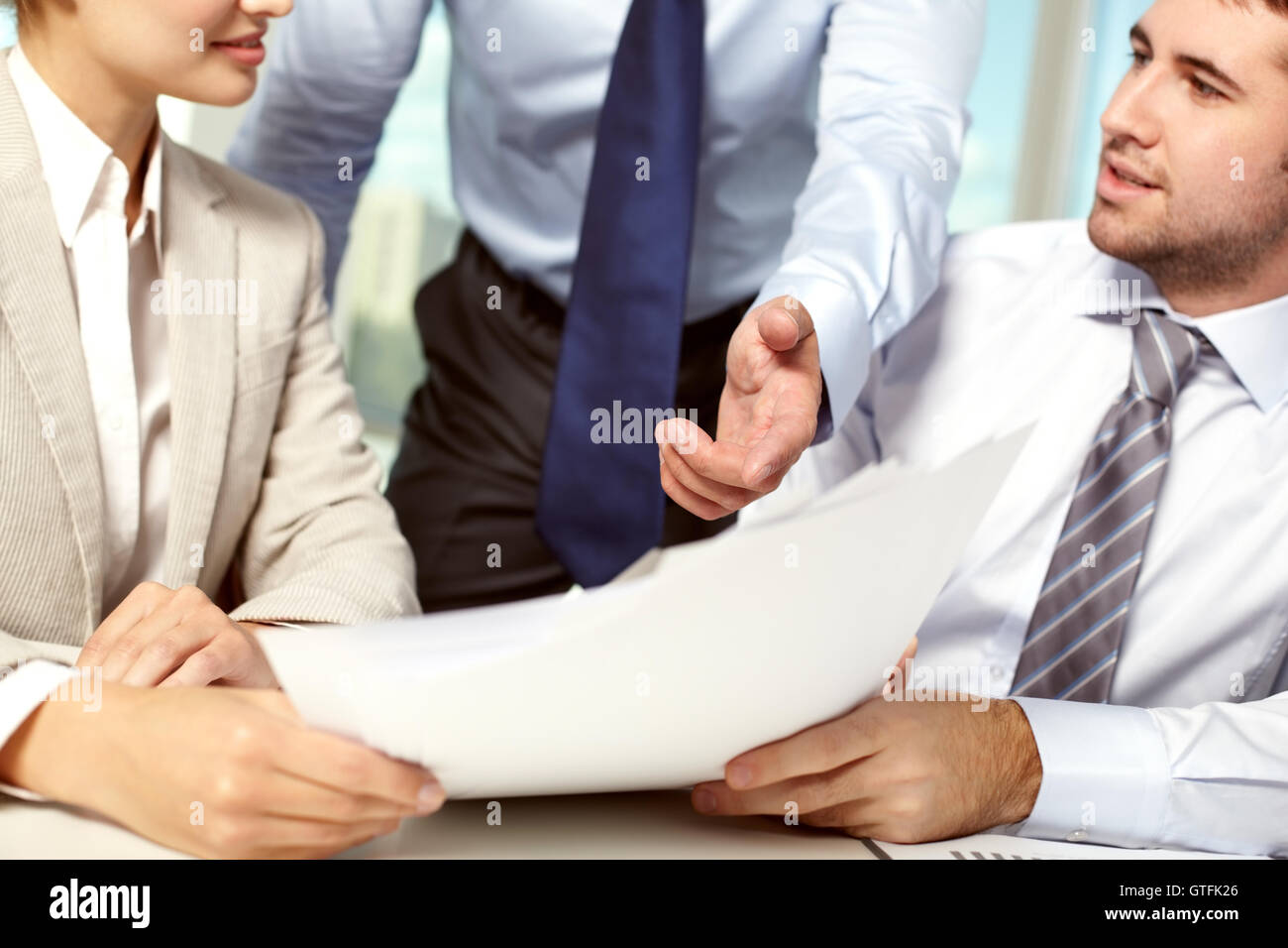 Business leader showing papers hi-res stock photography and images - Alamy