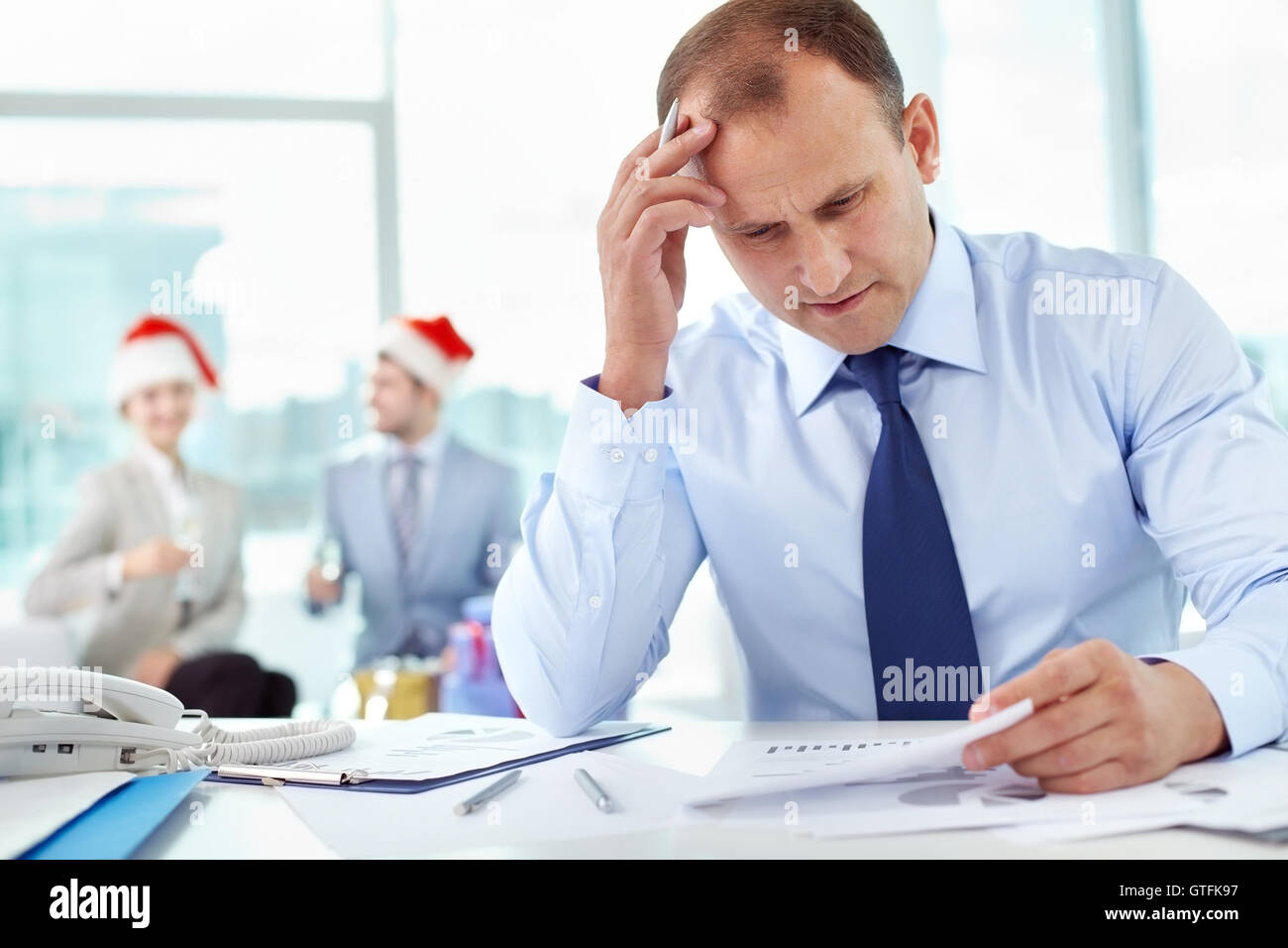 Working on holiday Stock Photo - Alamy