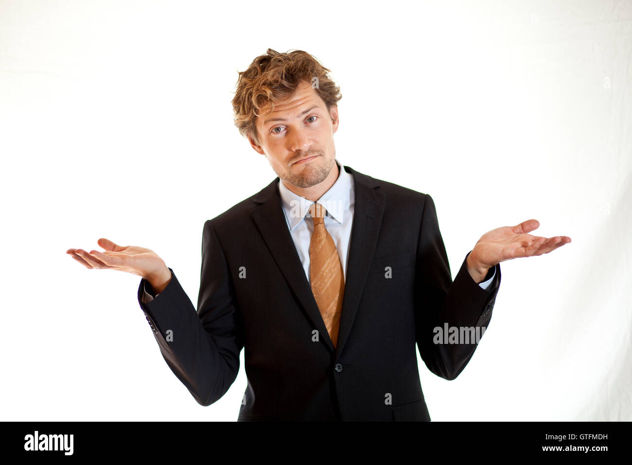 Bewildered businessman looking confused Stock Photo - Alamy