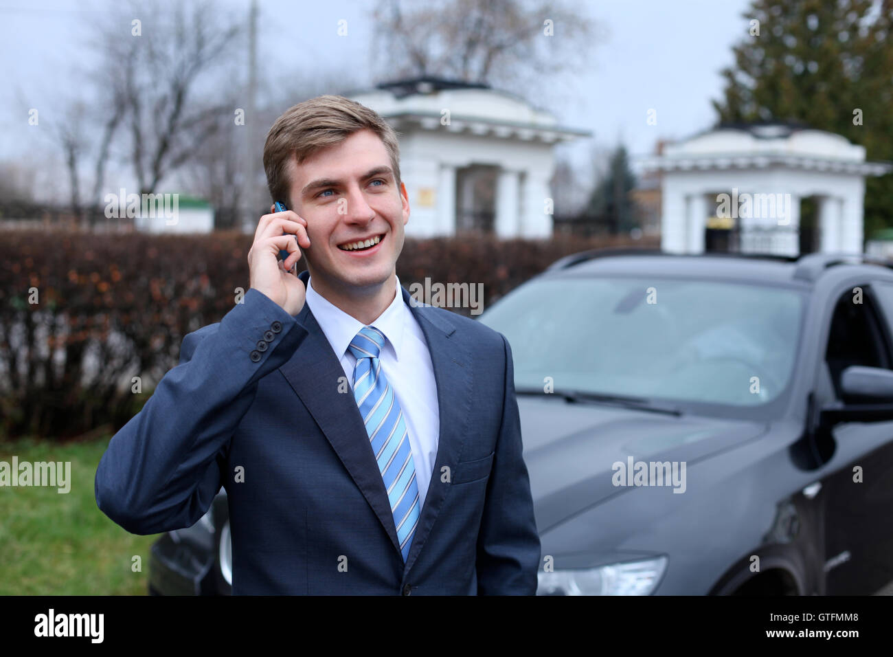 young attractive man calling by phone Stock Photo - Alamy