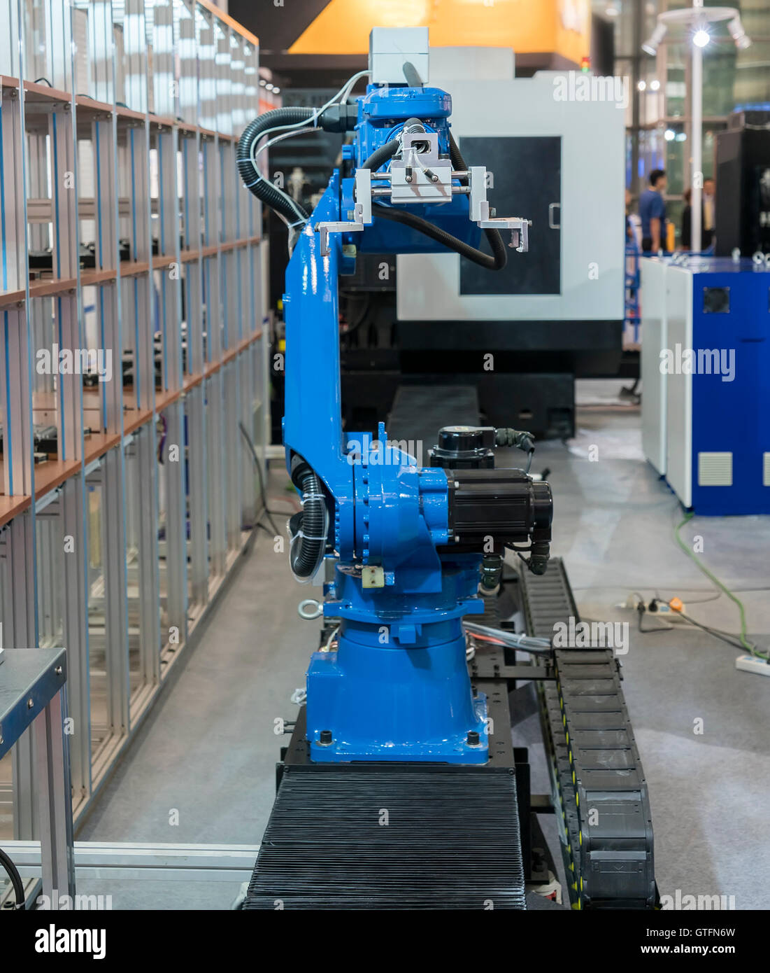 Robotic arm at production line in factory Stock Photo - Alamy