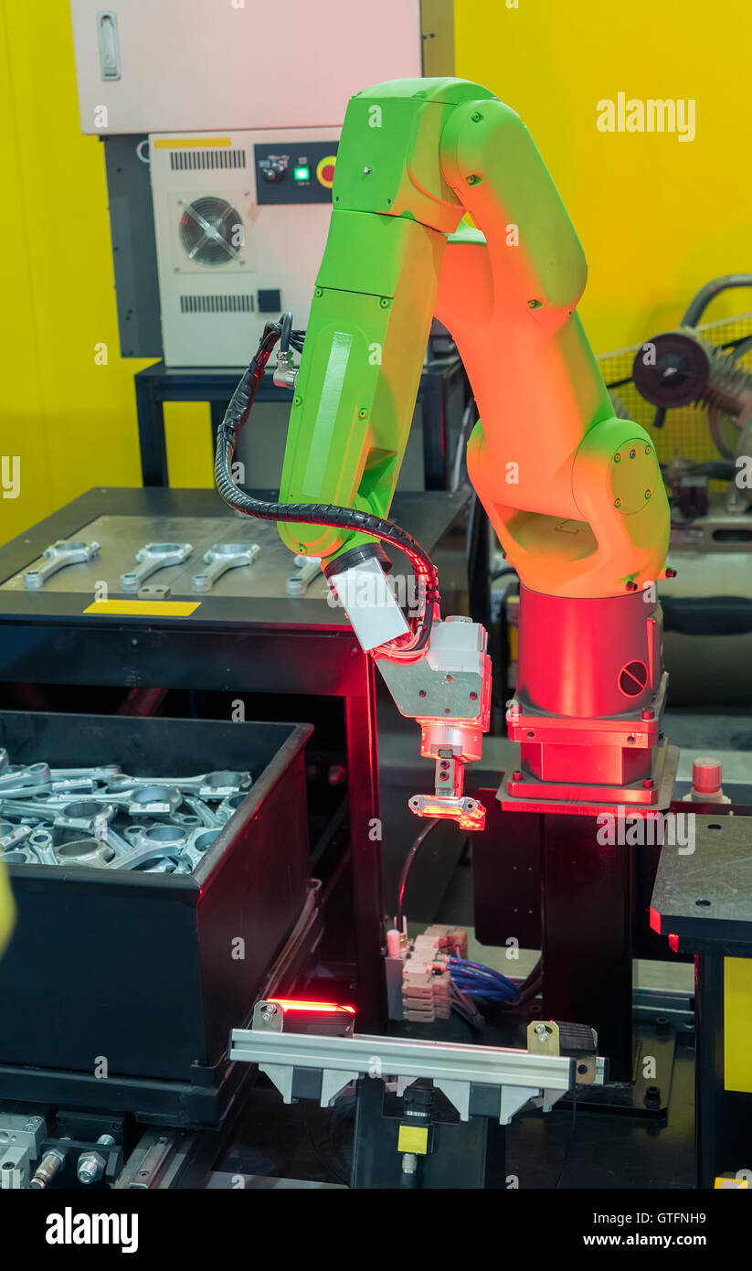 Robotic arm at production line in factory Stock Photo - Alamy