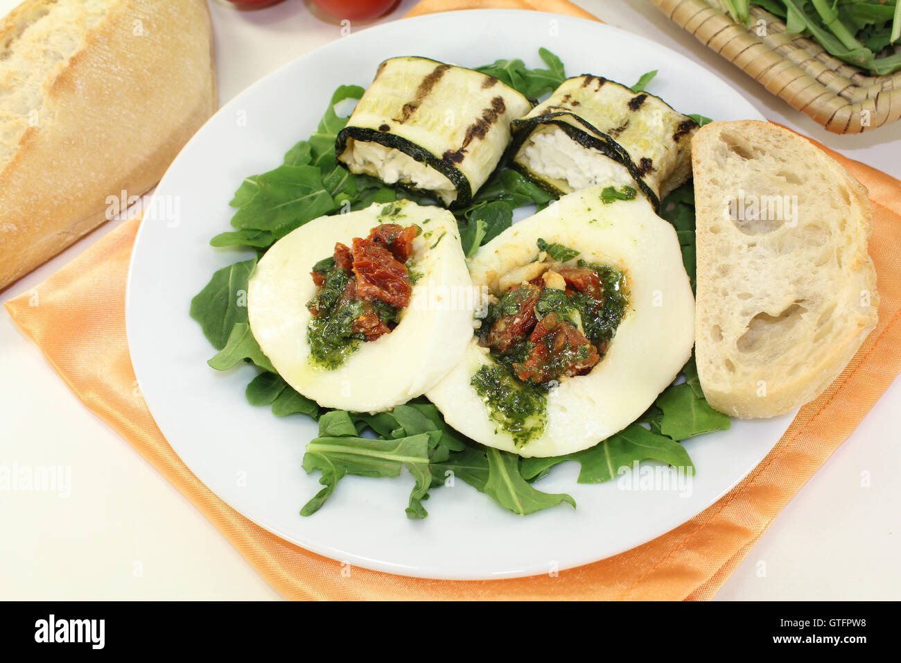 Courgette rolls and stuffed mozzarella Stock Photo - Alamy