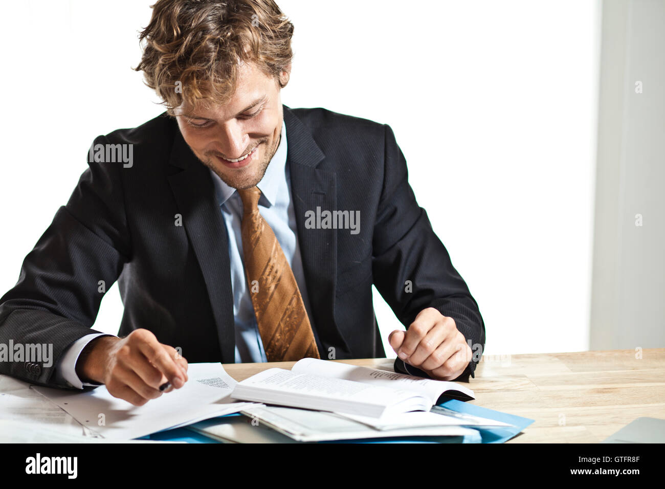 Reading something funny hi-res stock photography and images - Alamy