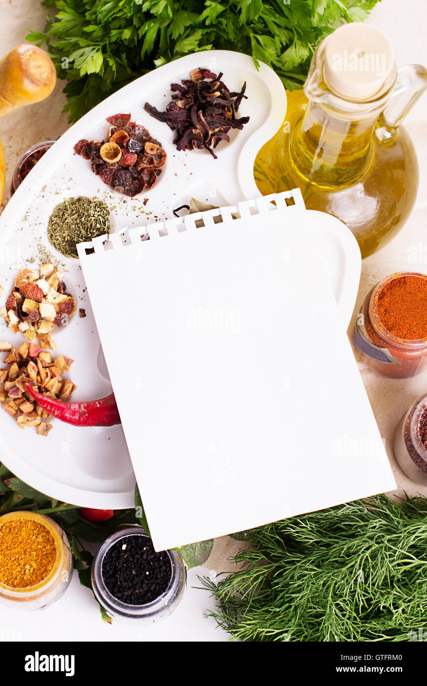 Blank notebook sheet with spices and herbs Stock Photo - Alamy