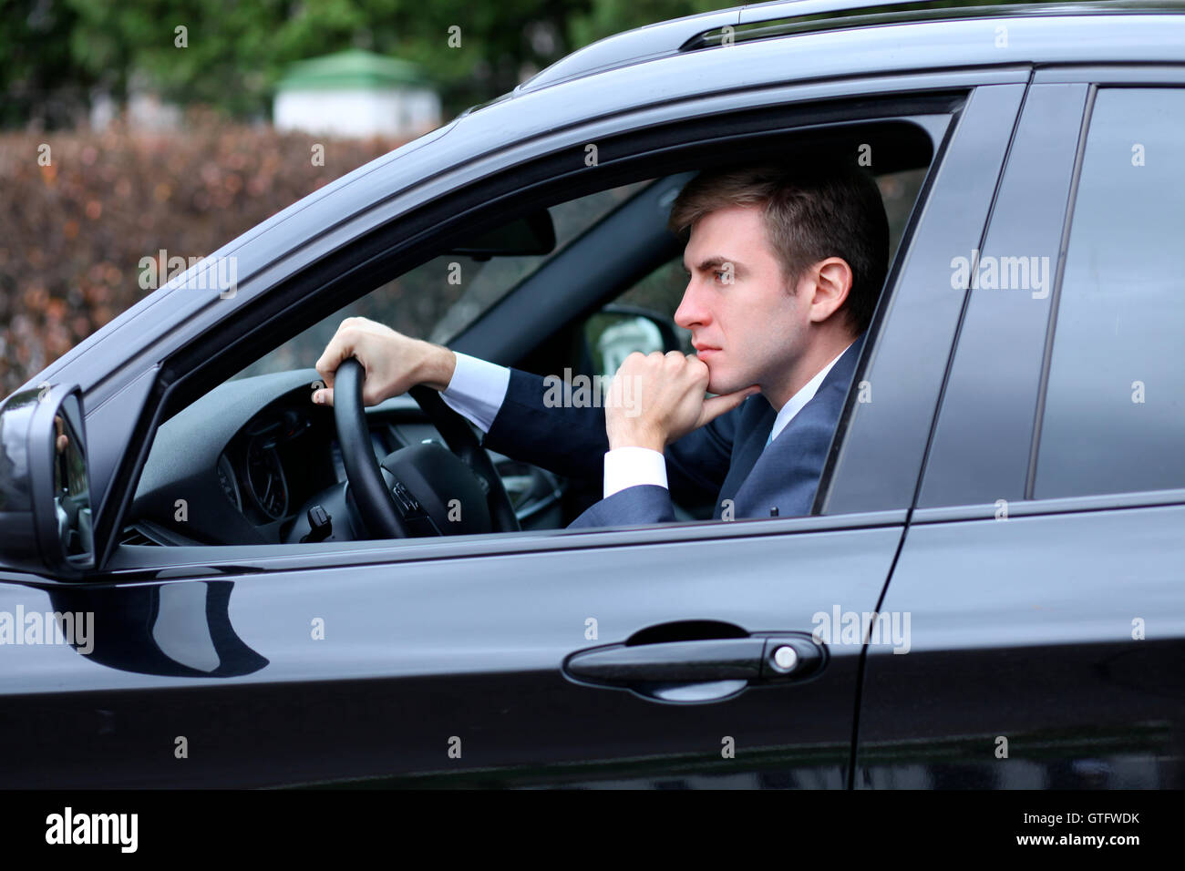 Man in suit model car hi-res stock photography and images - Alamy