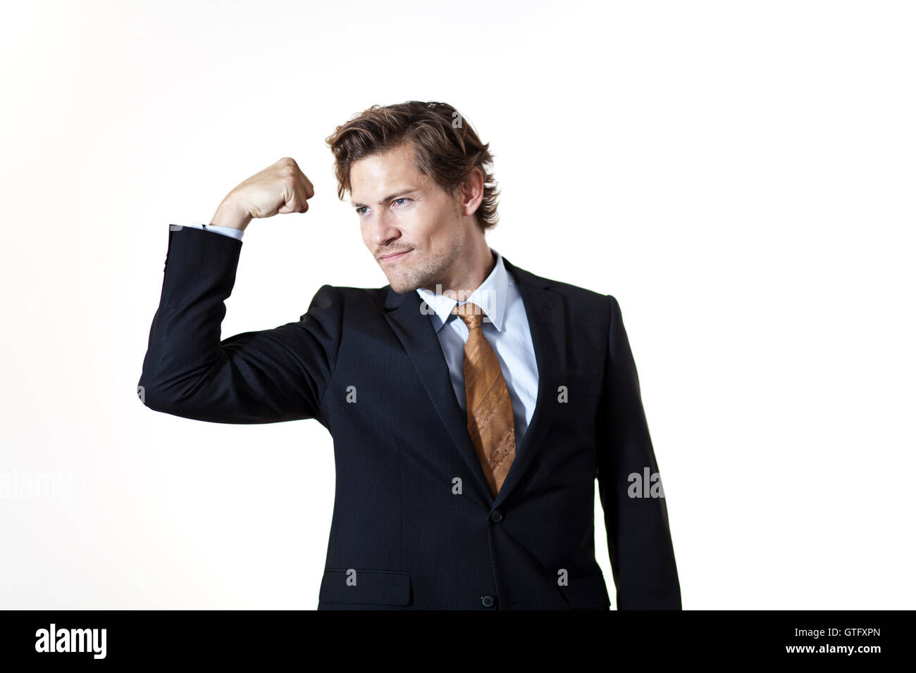 Strong businessman flexing Stock Photo - Alamy
