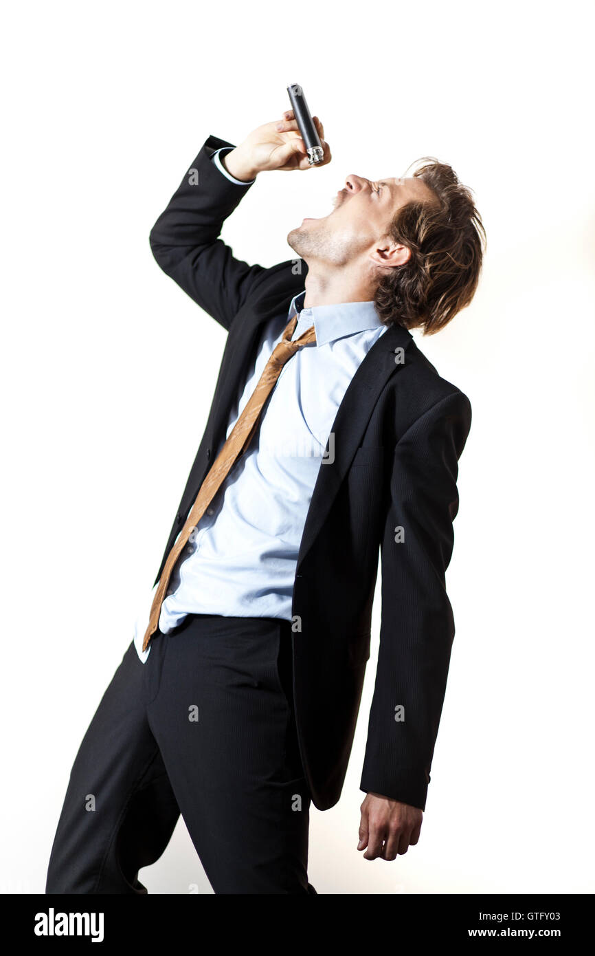 Heavy drinking businessman Stock Photo - Alamy