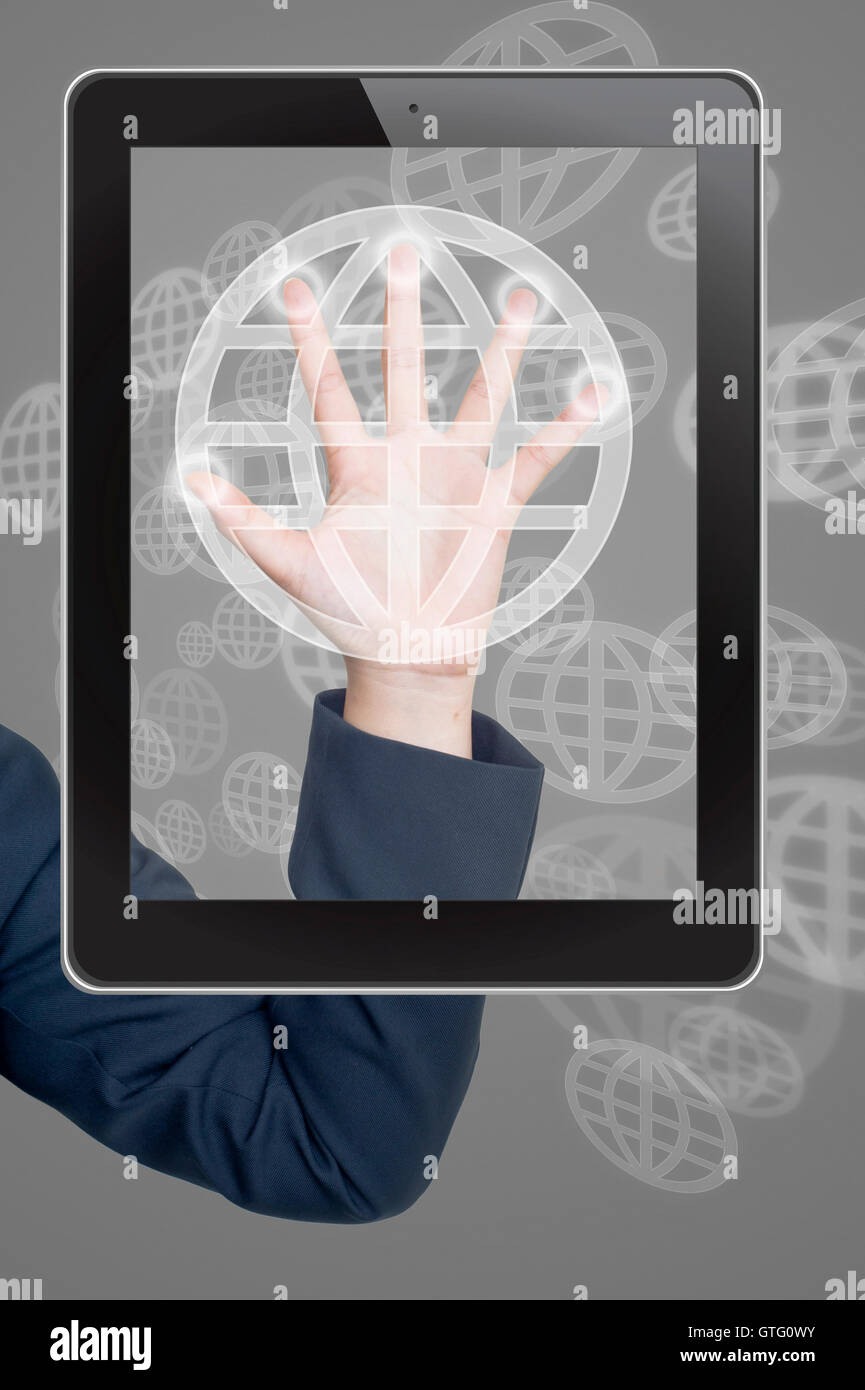 Hand pushing global button on tablet on a touch screen interface Stock ...