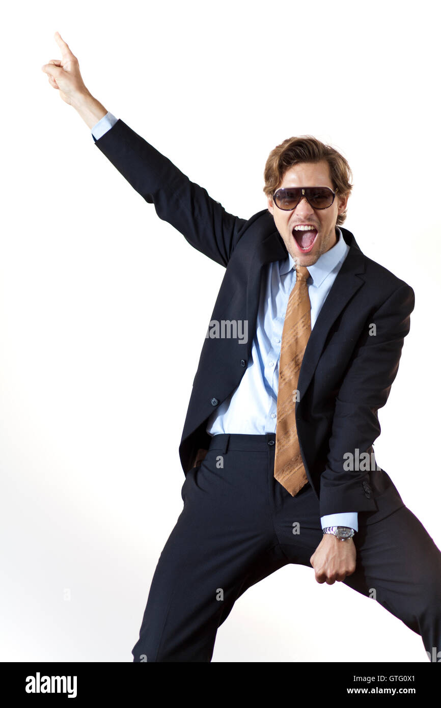 Cool businessman letting loose Stock Photo - Alamy