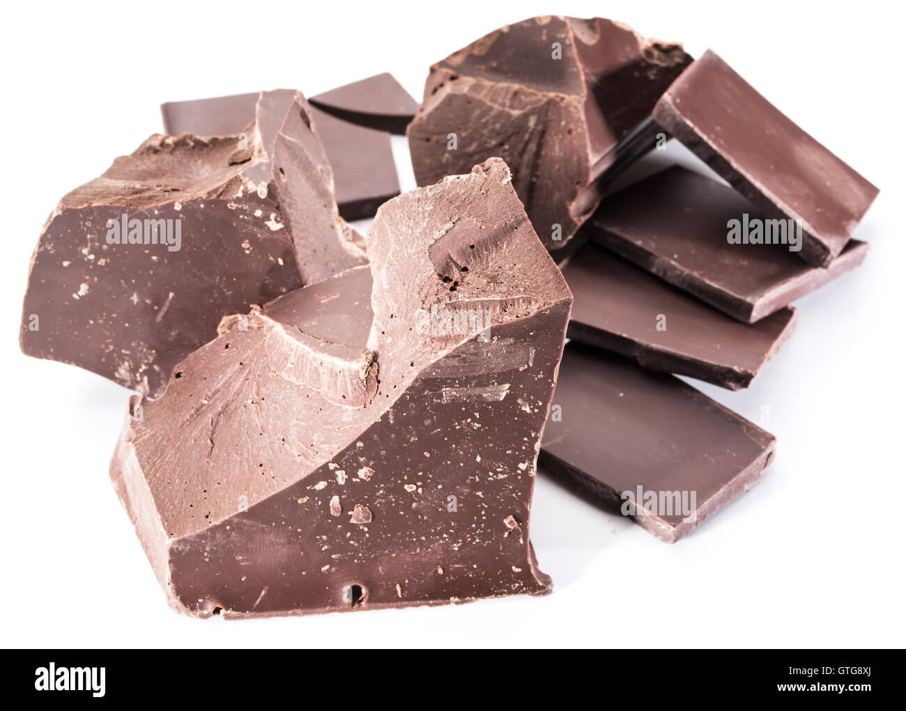Chocolate blocks and pieces of chocolate bar isolated on a white ...