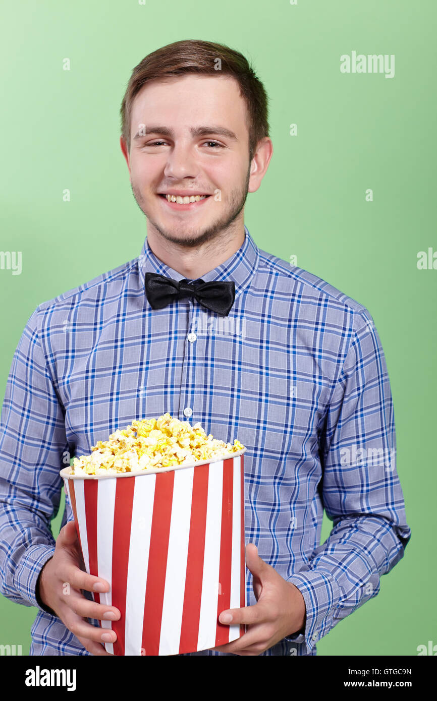 young man with popcorn Stock Photo - Alamy