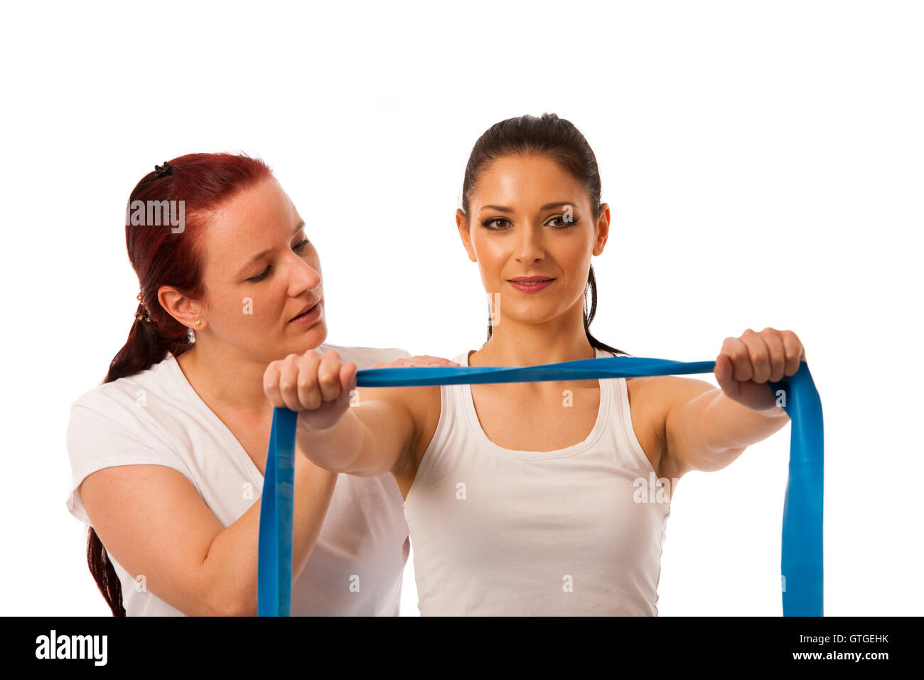 Physiotherapy - therapist doing arm straightening exercises with a ...