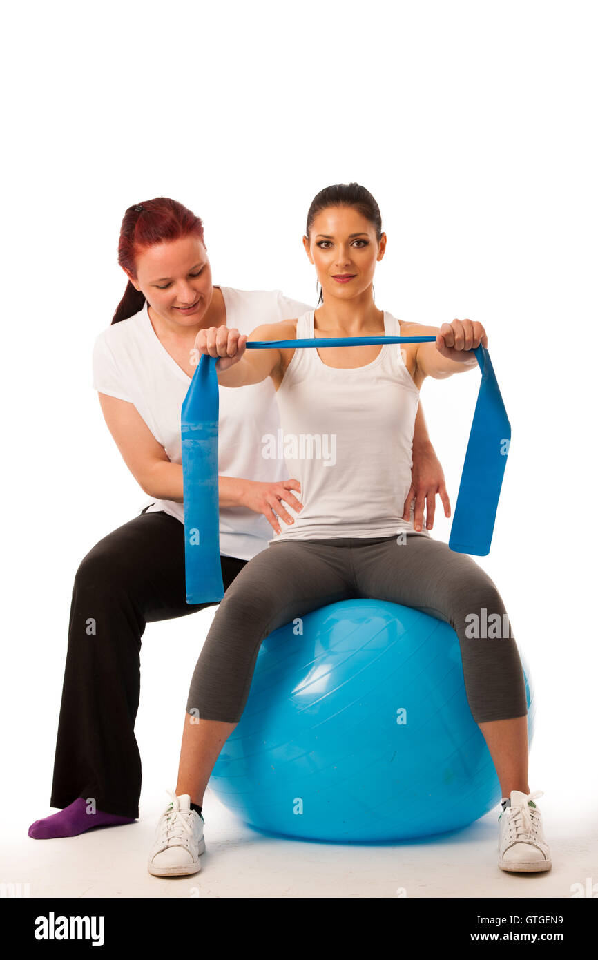 Physiotherapy - therapist doing arm strenghteninh excercises with a ...