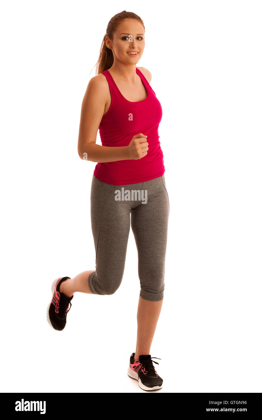 fit woman running isolated over white background Stock Photo - Alamy