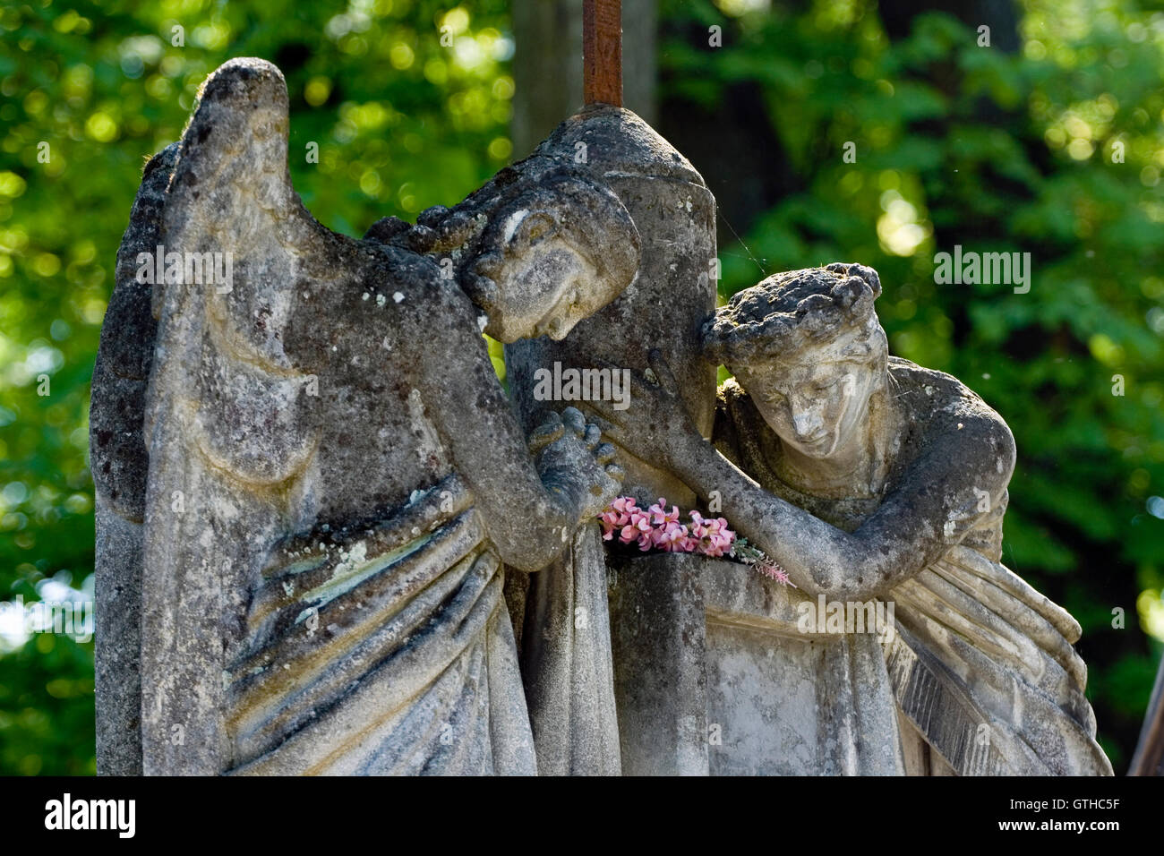 Old cemetery angel sculpture made of stone Stock Photo - Alamy