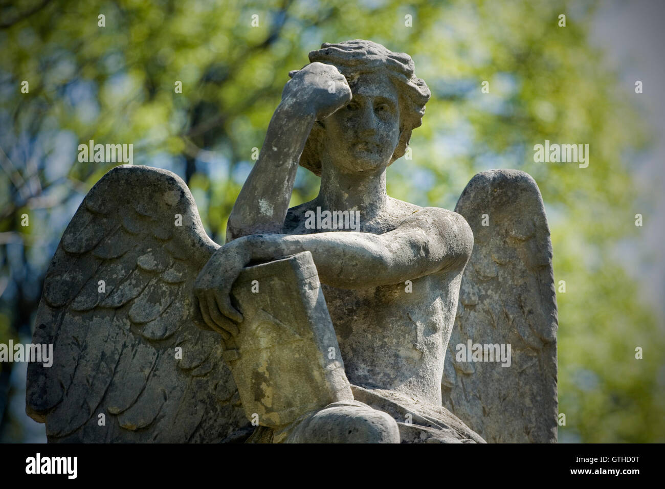 Old cemetery angel sculpture made of stone Stock Photo - Alamy