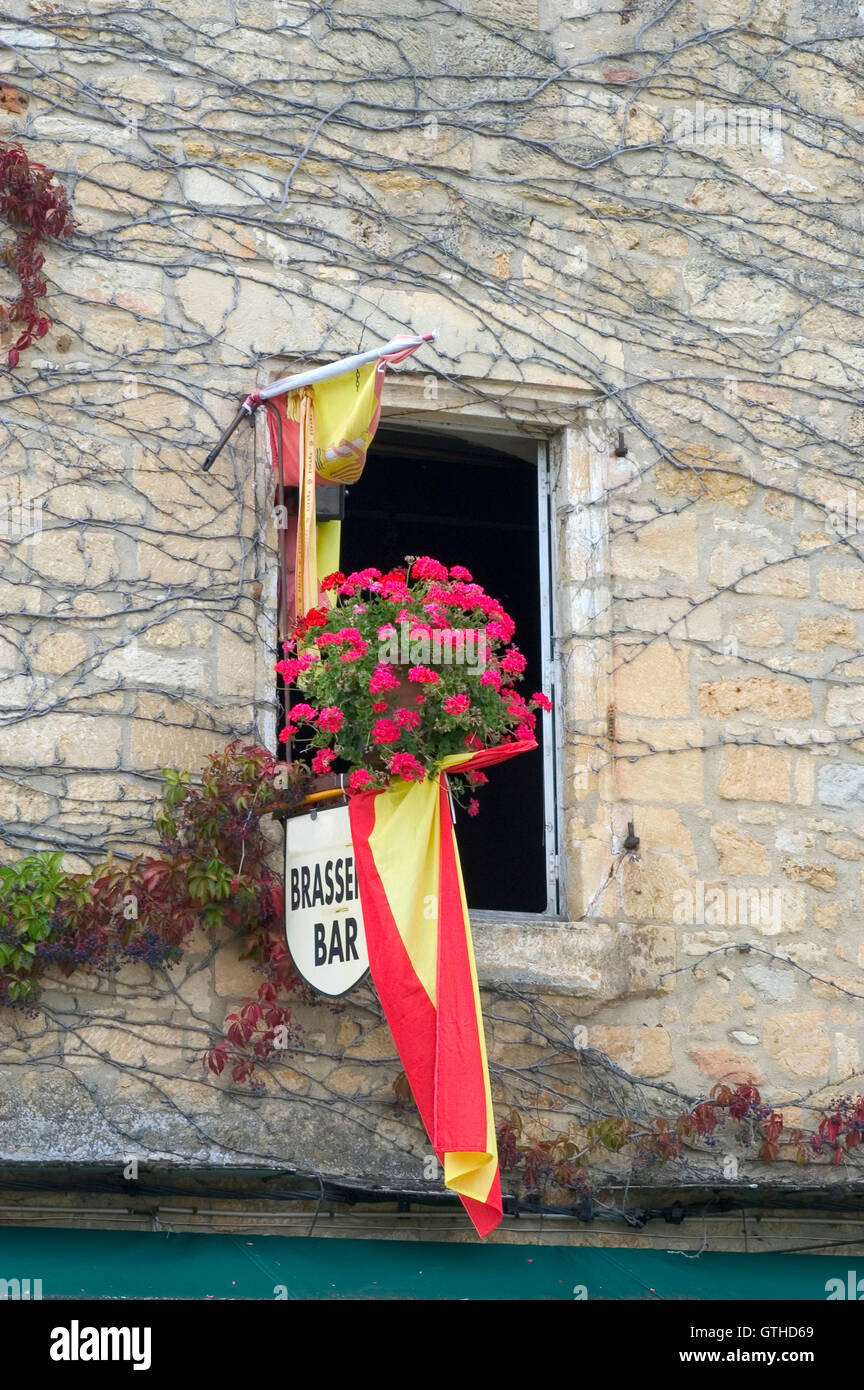 Small window of a restaurant bar in the village of Domme in Perigord ...
