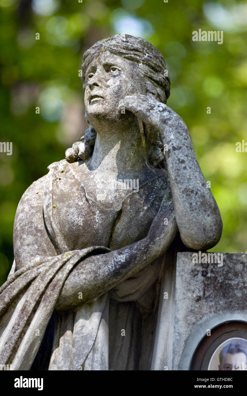 Old cemetery angel sculpture made of stone Stock Photo - Alamy