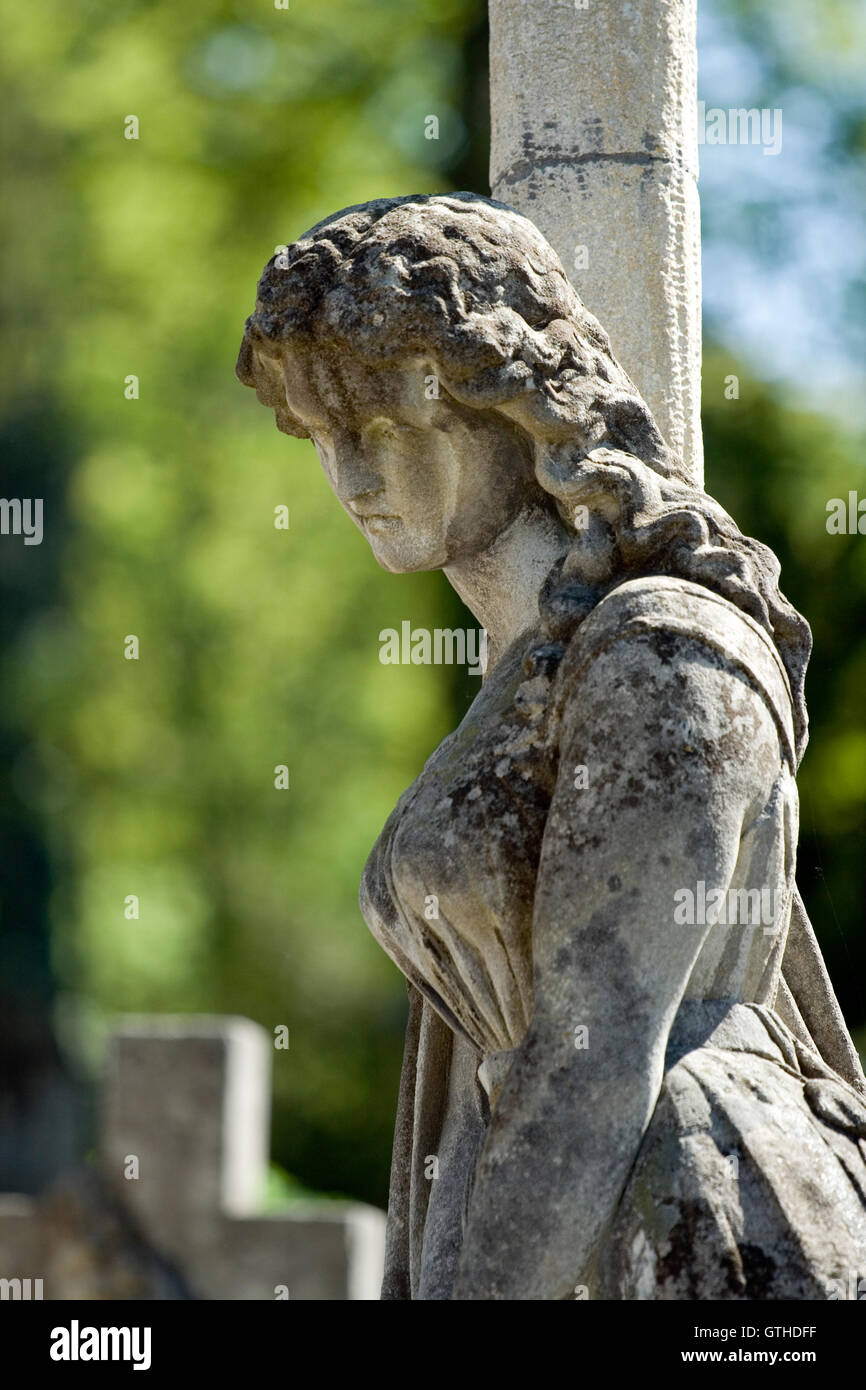 Old cemetery angel sculpture made of stone Stock Photo - Alamy