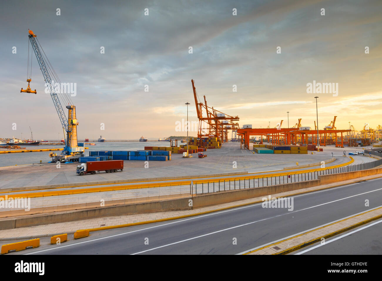 Container port of Piraeus at sunset Stock Photo - Alamy