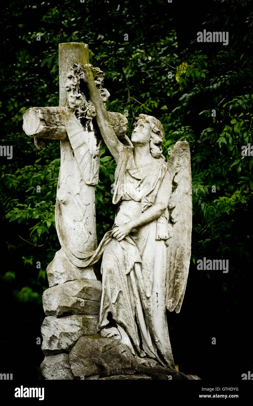 Old cemetery angel sculpture made of stone Stock Photo - Alamy