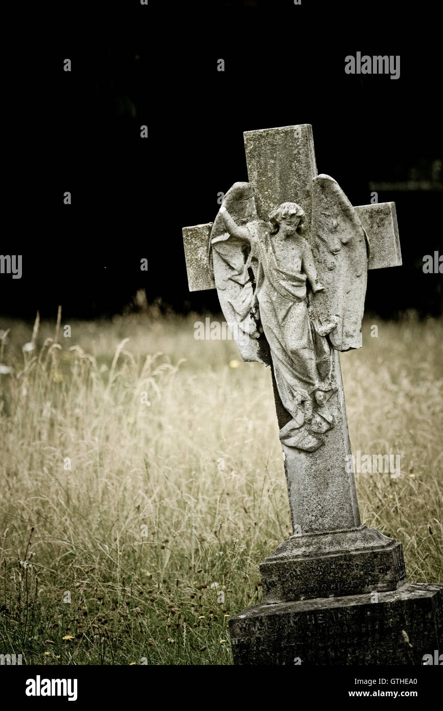 Old cemetery angel sculpture made of stone Stock Photo - Alamy