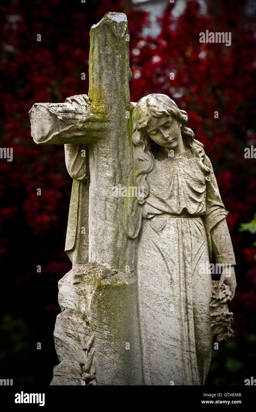 Old cemetery angel sculpture made of stone Stock Photo - Alamy