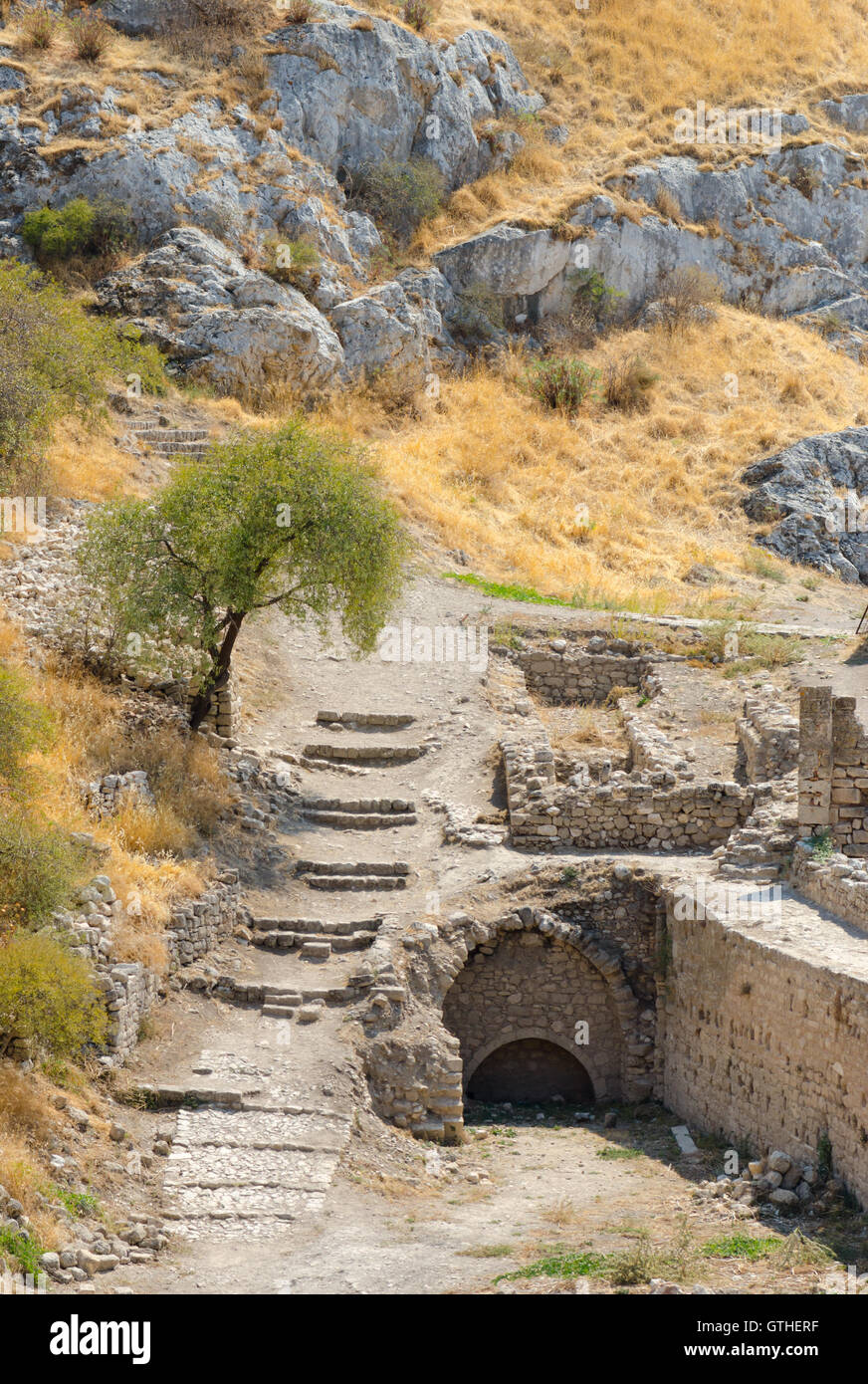 Ruins of a path with stone stairs and old stone wall in mountain Stock ...