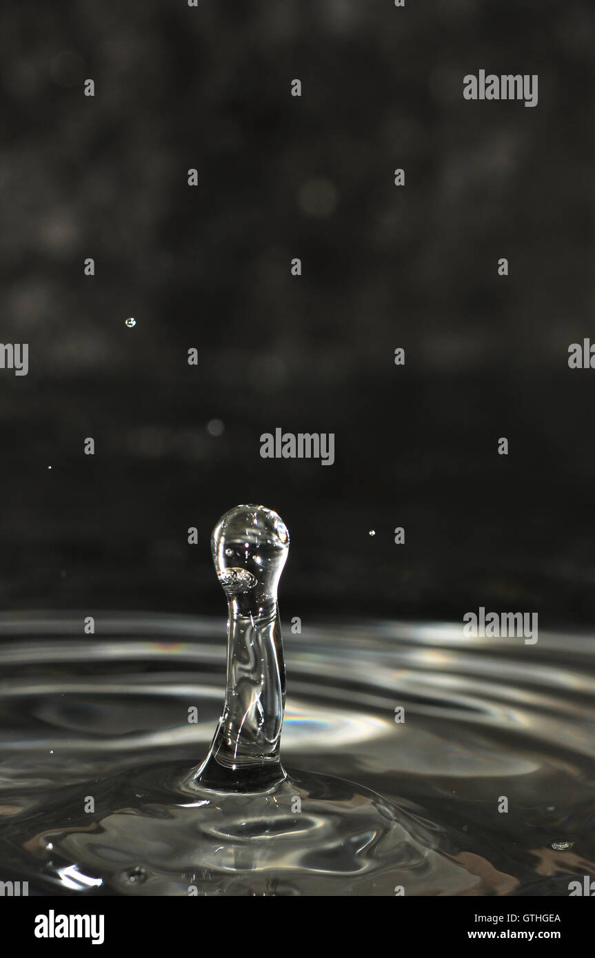 Clear water drops captured Stock Photo - Alamy
