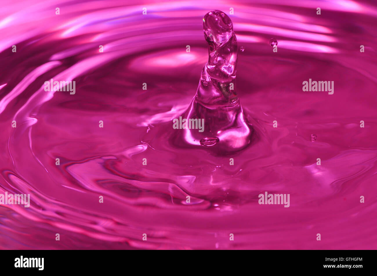 Pink water drops Stock Photo - Alamy