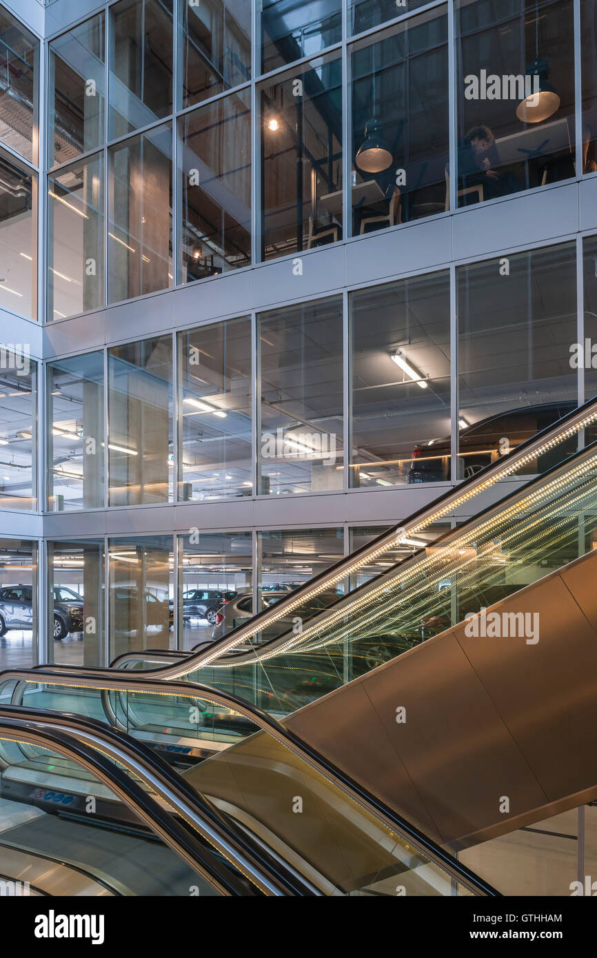 Parking floors are located between ground floor foyer and office floors ...