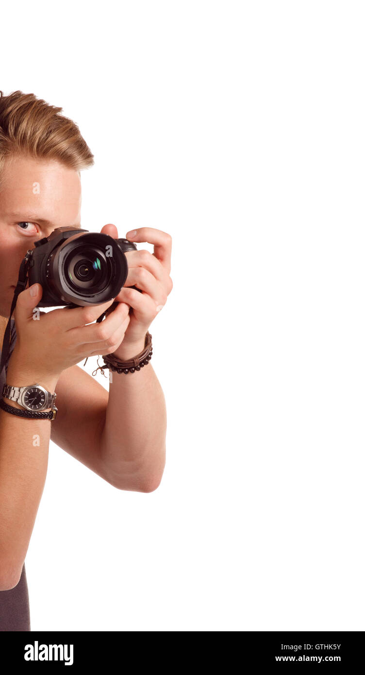 Closeup portrait of a young man taking a picture from corner over white ...