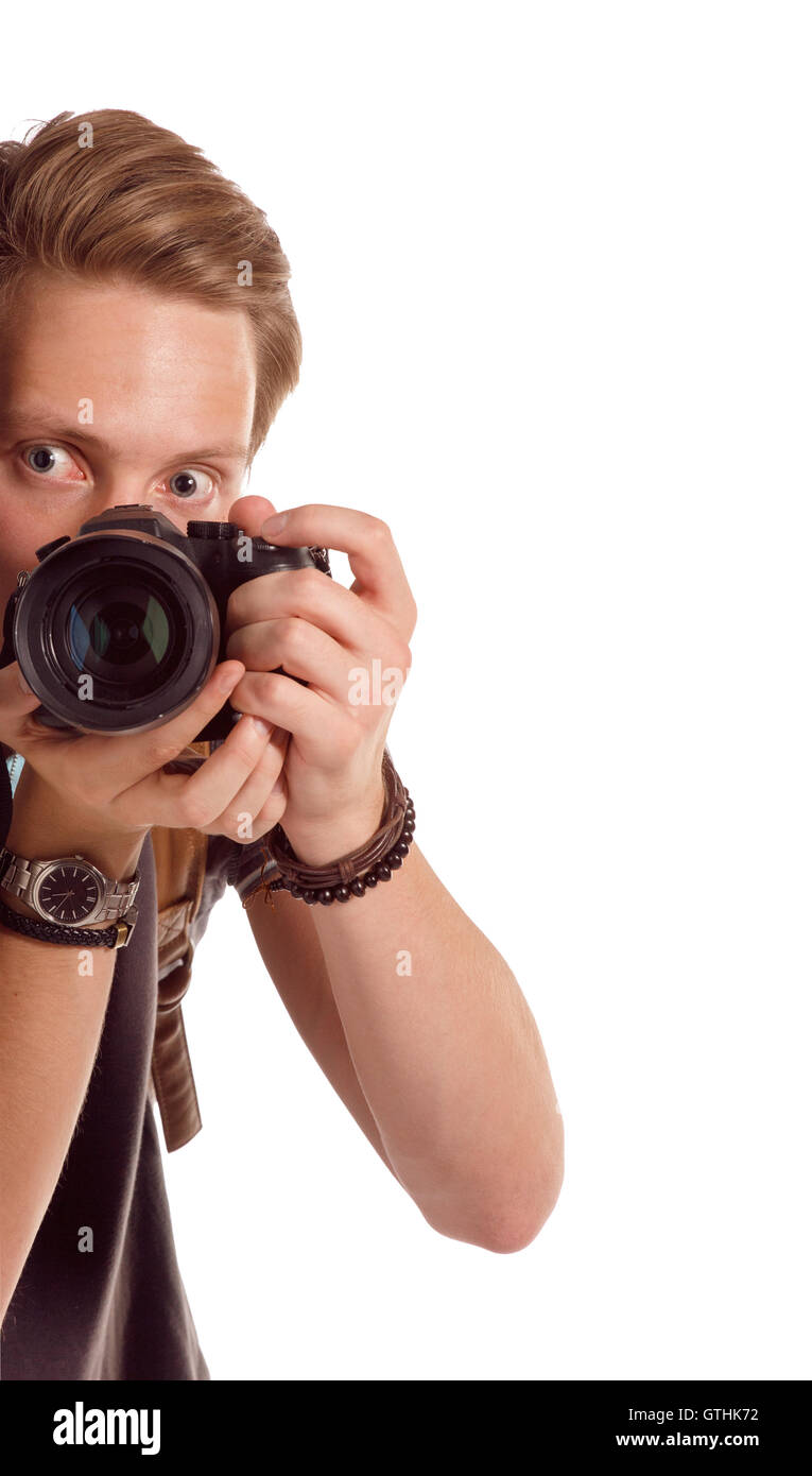 Closeup portrait of a young man taking a picture from corner over white ...