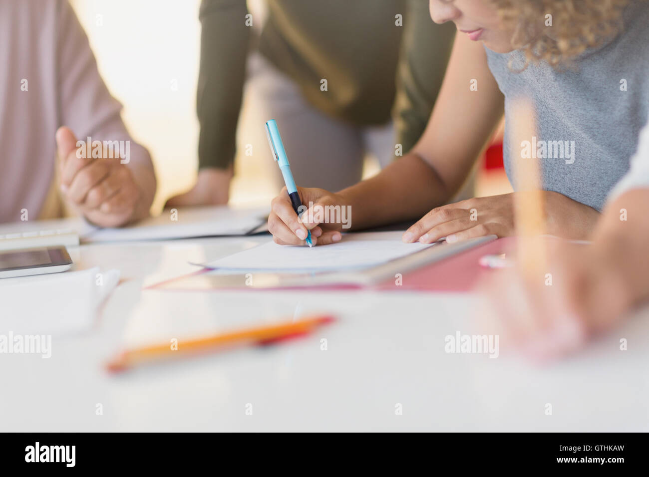 Hand taking notes hi-res stock photography and images - Alamy