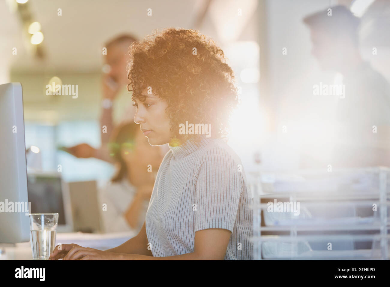 Woman typing computer back view hi-res stock photography and images - Alamy