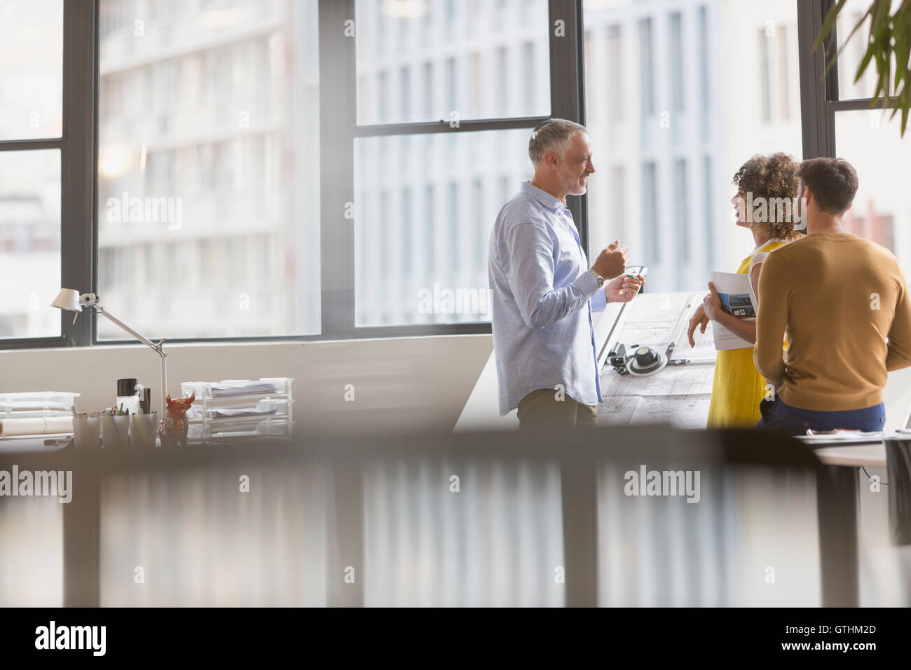 Architects meeting in office Stock Photo - Alamy