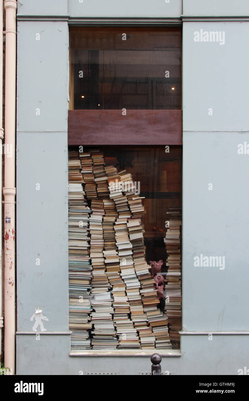 Books behind a window in Paris (France Stock Photo - Alamy
